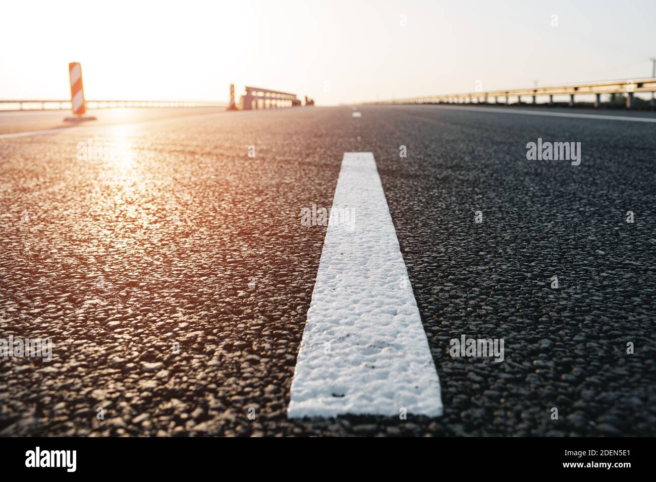 White marking line on asphalt road on highway Stock Photo - Alamy