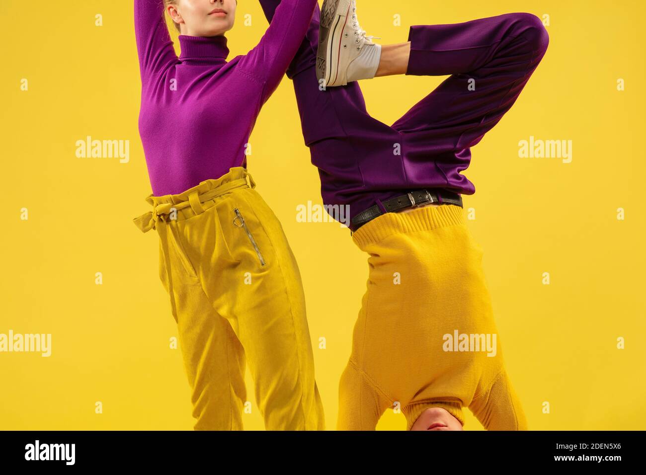 Portrait of two friends going crazy, having fun. Bright clothes, trendy ...