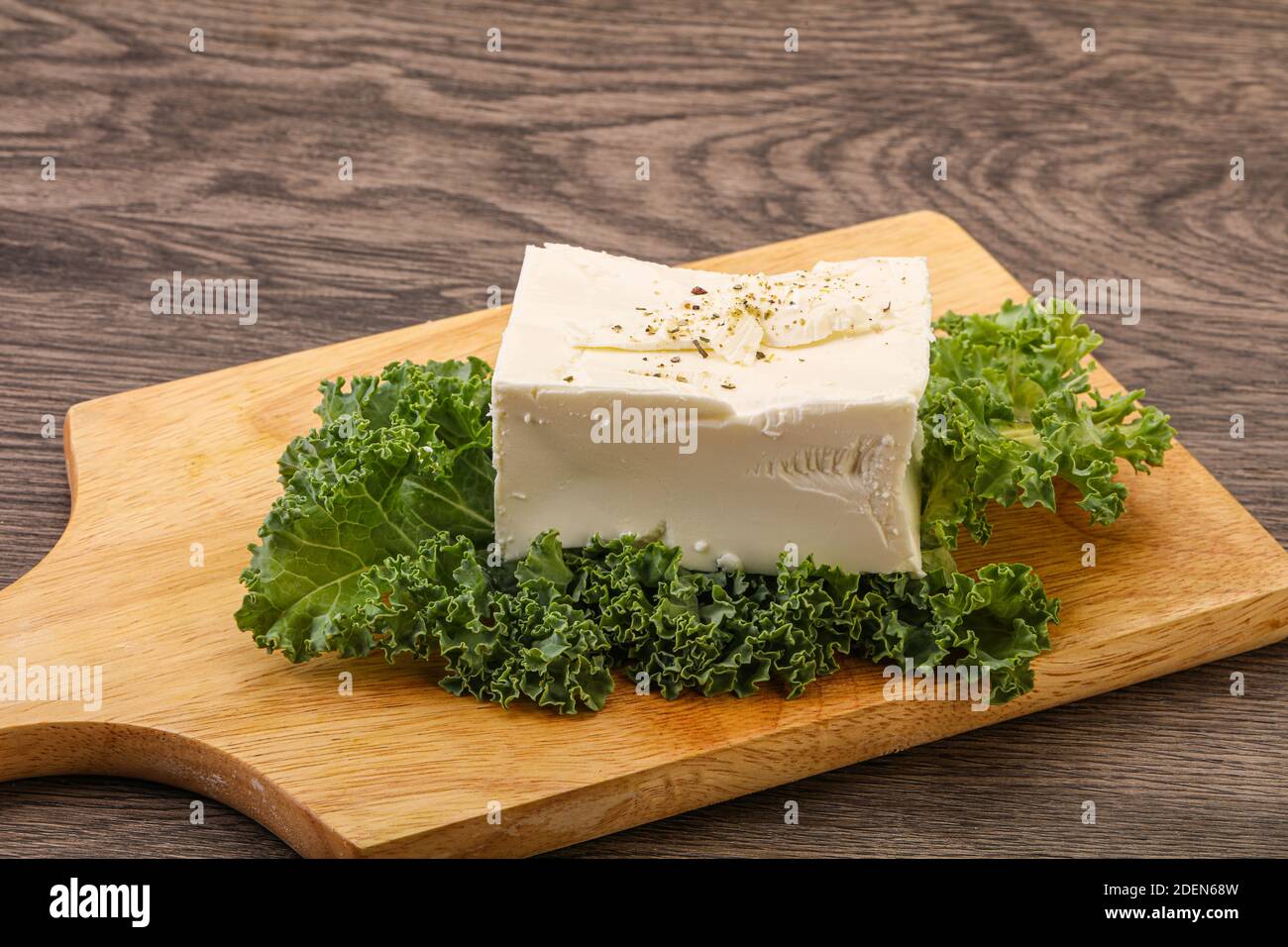 Traditional tasty Greek Feta soft cheese brick Stock Photo - Alamy