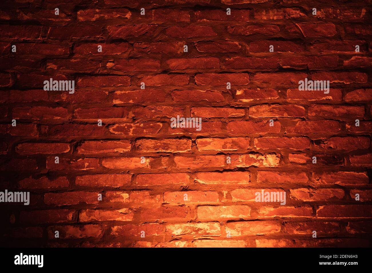 Neon glow effect on burnt orange brick wall as background texture Stock ...