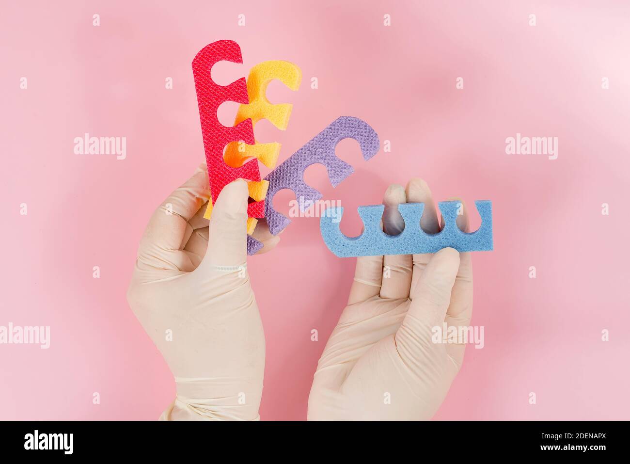 Finger separators hi-res stock photography and images - Alamy