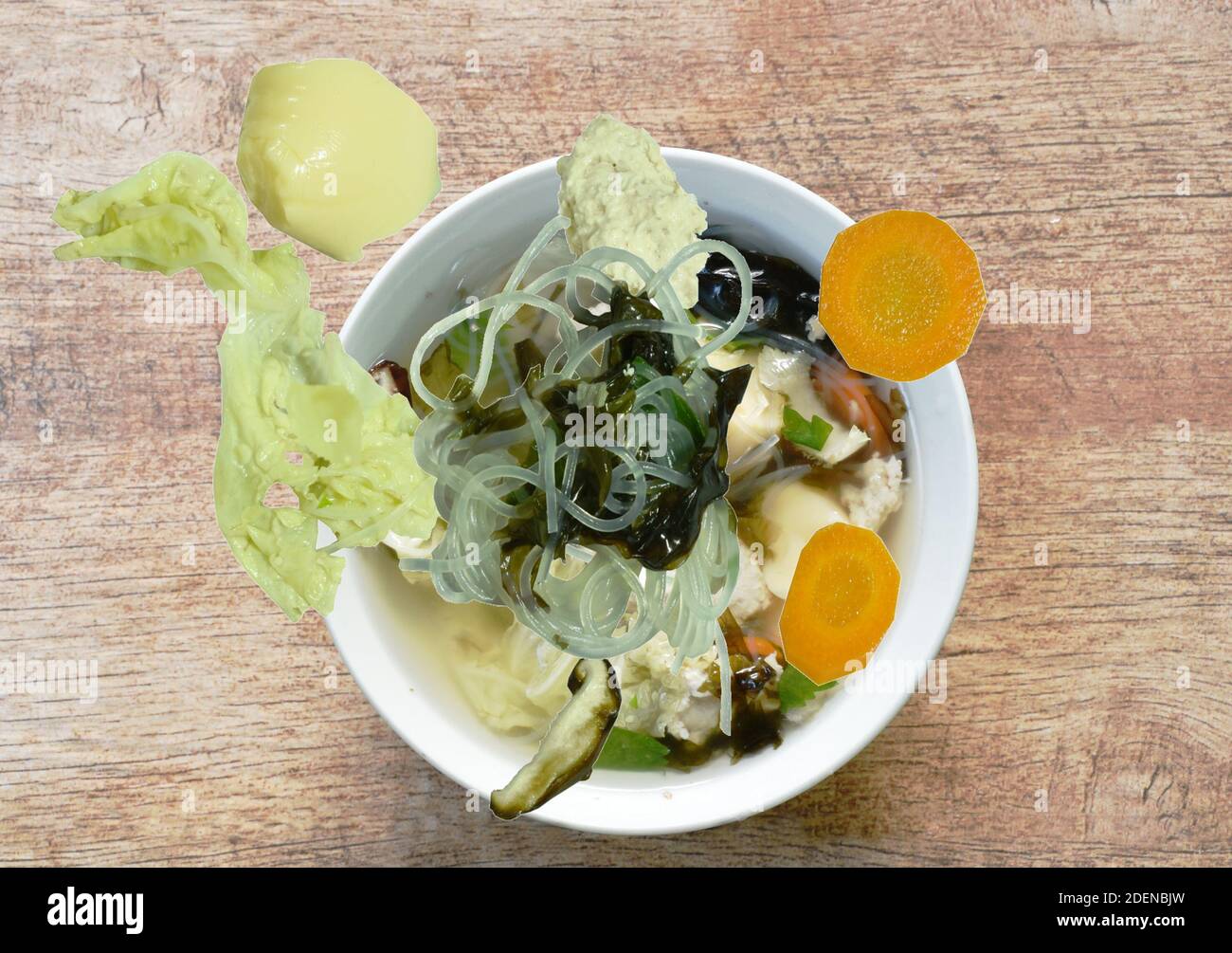 boiled vegetable gourd minced pork and blood with egg tofu soup on bowl ...