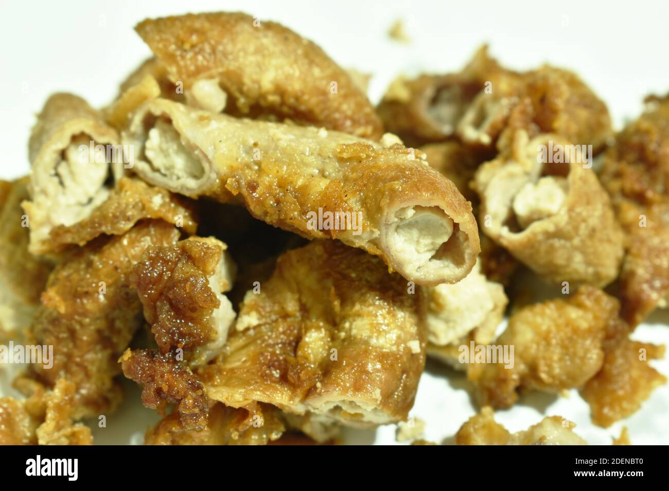 batter fried pork innards with flour on white background Stock Photo ...