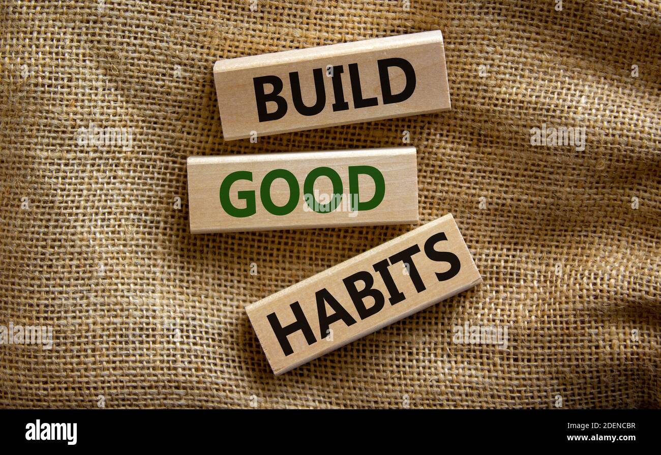 Time to build good habits. Wooden blocks with words 'build good habits ...
