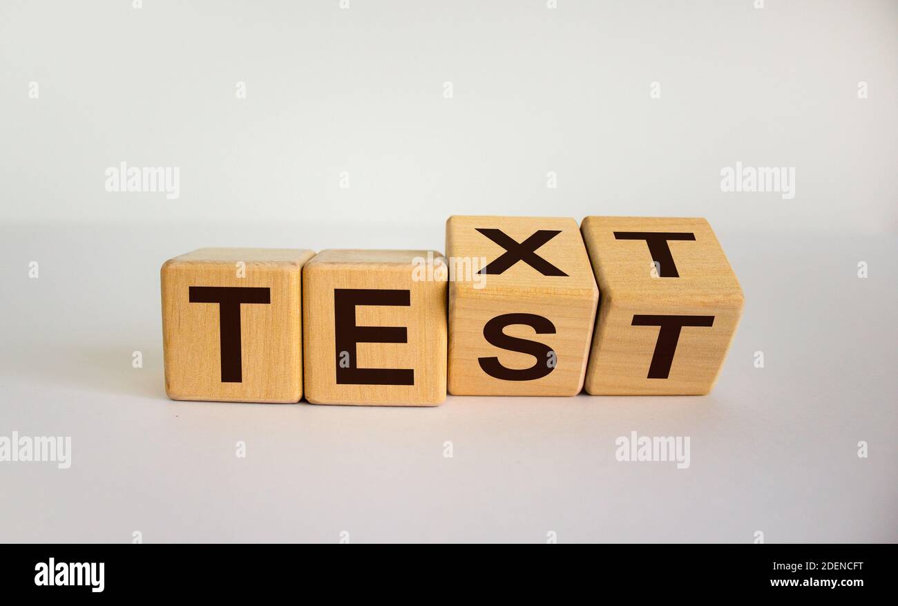 Text of test symbol. Fliped wooden cube and changed the word 'test' to ...