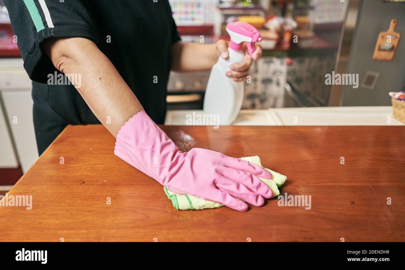 Wiping a surface with disinfectant hi-res stock photography and images ...
