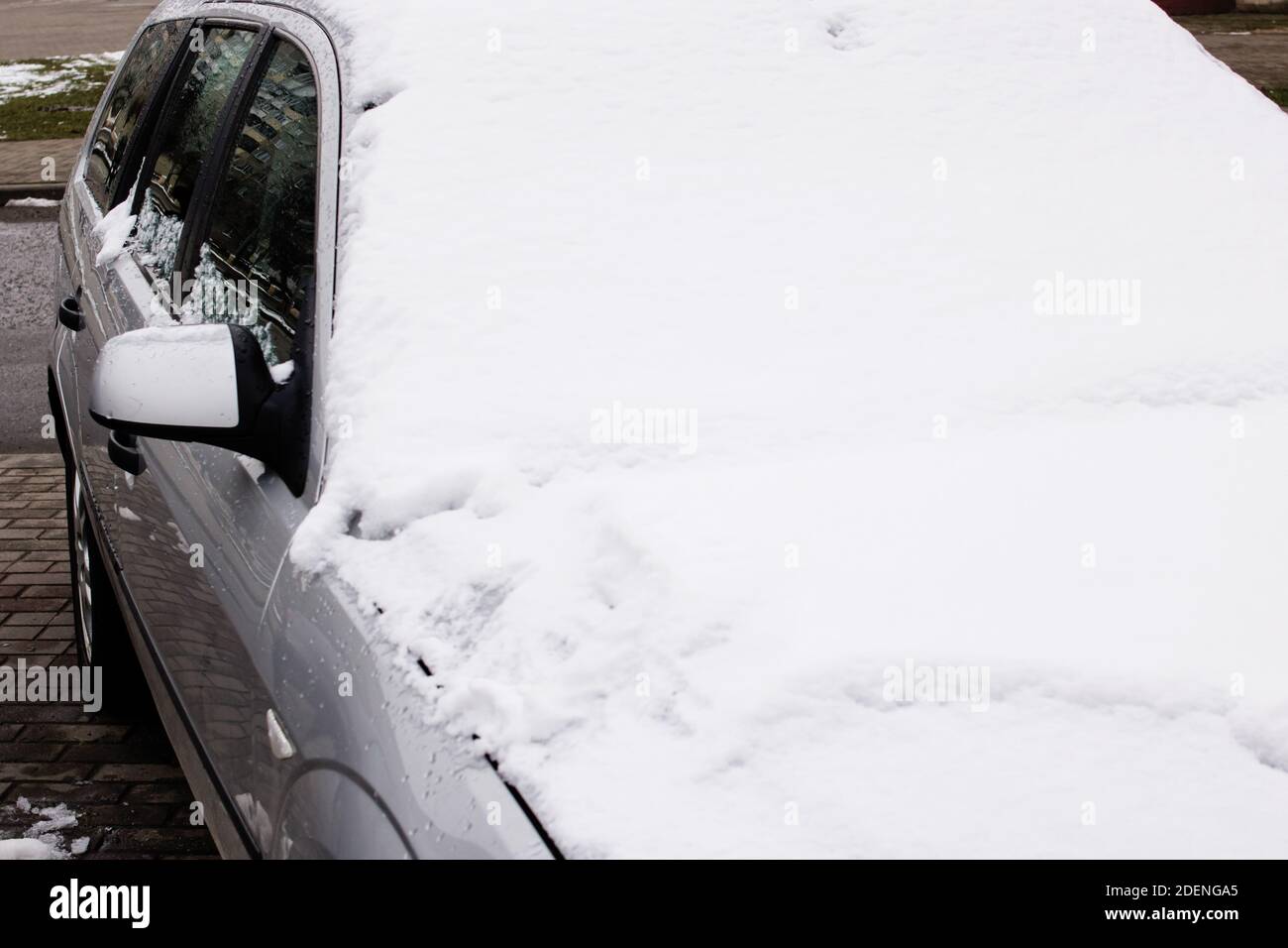 A lot of snow on hood of car Stock Photo - Alamy