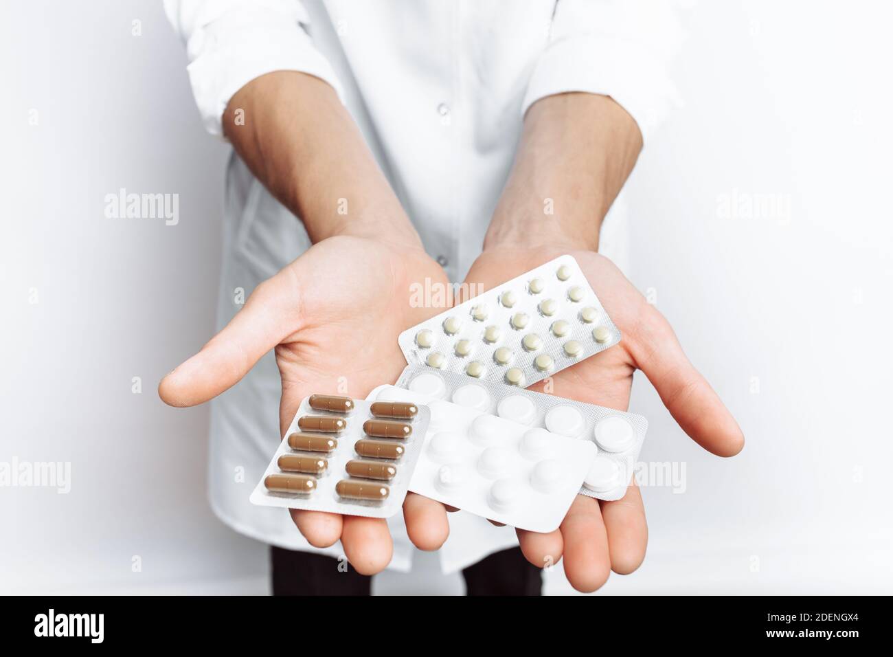 Hand doctor holding tablet, close-up, white background, for advertising ...
