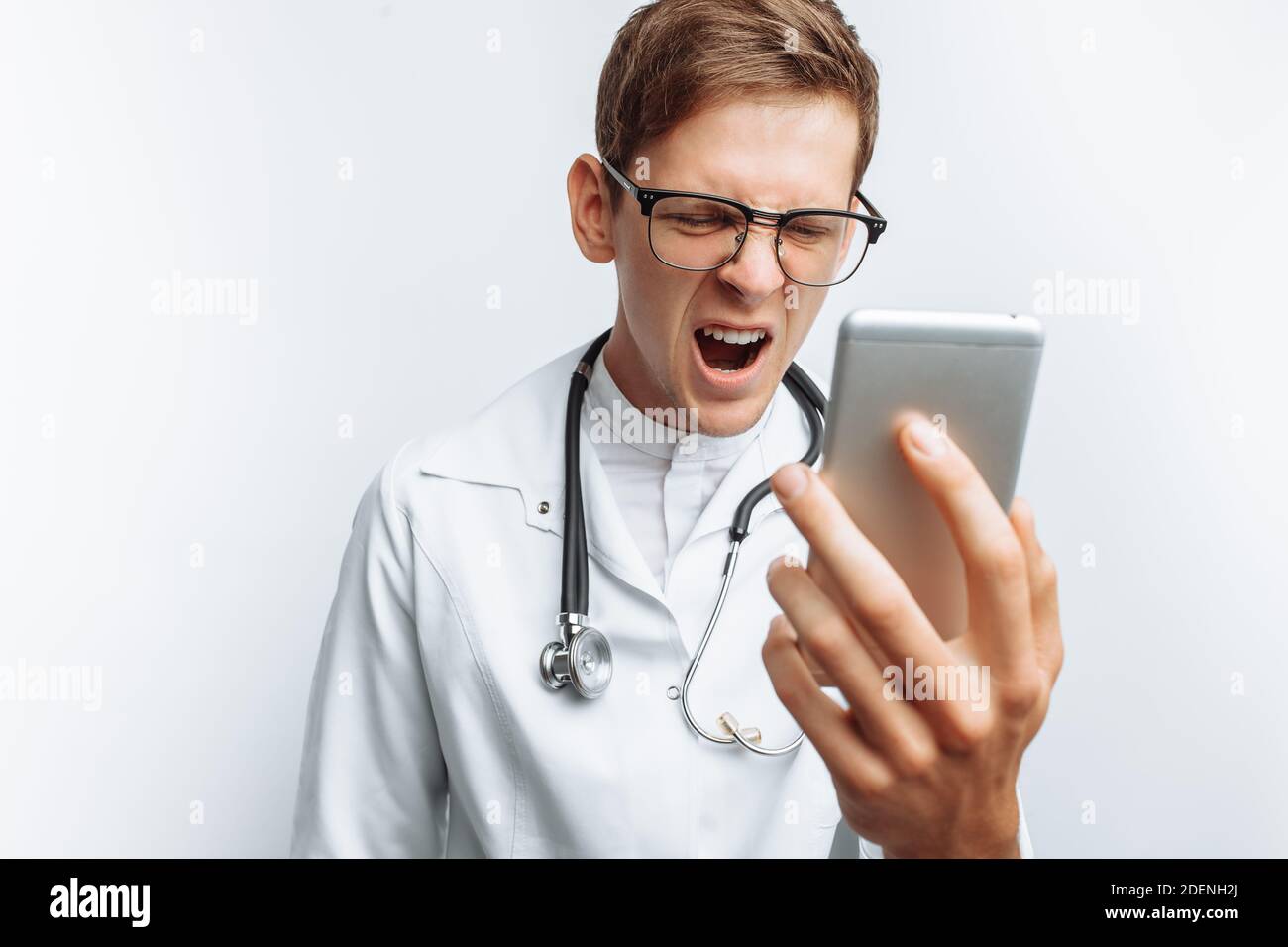 The doctor yells into the phone, the conversation with the patient, the ...