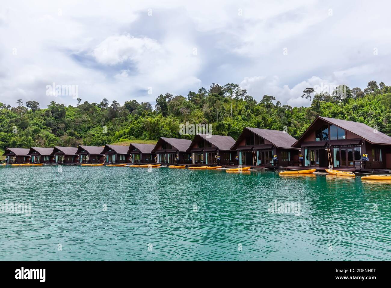 Luxury Resort with Floating Raft Houses on Green Lake with Tropical ...
