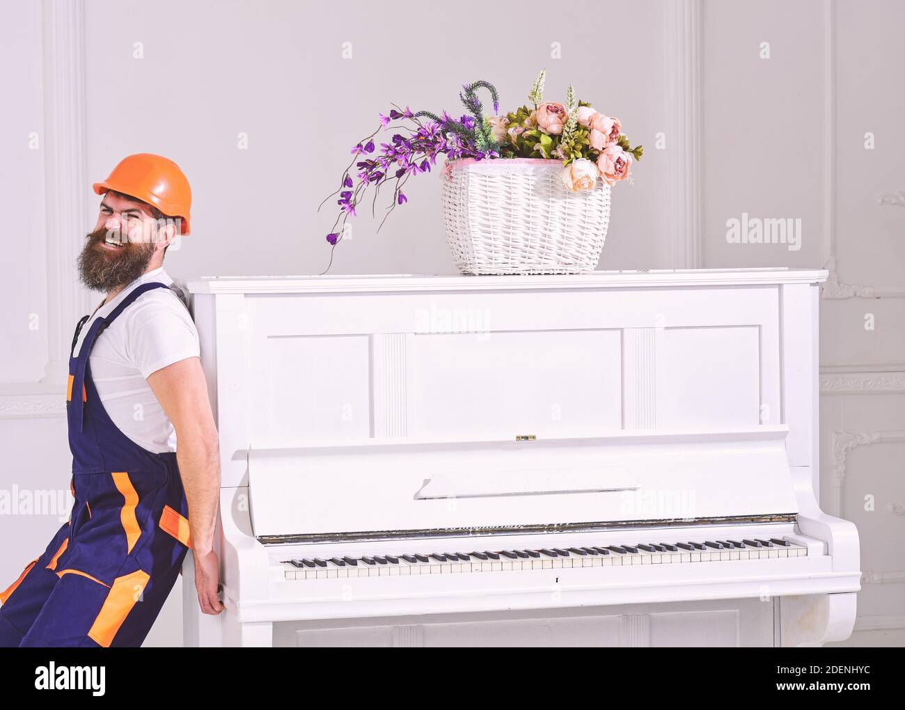 Courier delivers furniture, move out, relocation. Man with beard worker ...