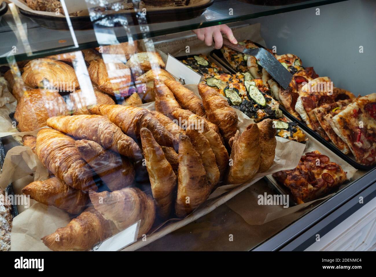 Croissants and pizzas in the window of Bakery Nouveau, Capitol Hill ...
