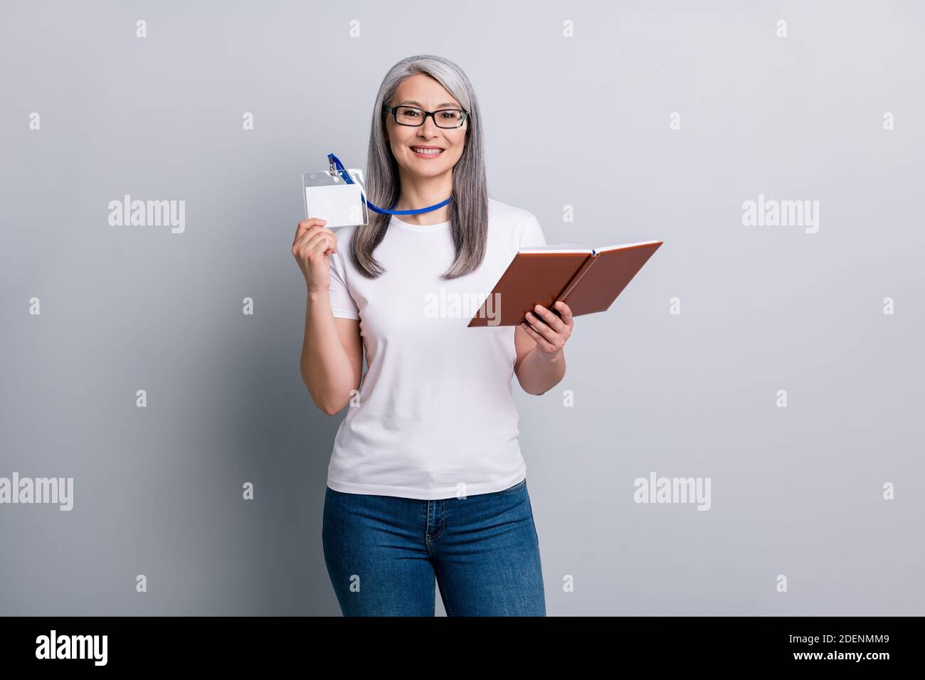 Photo of charming old woman dressed casual outfit eyewear showing id ...