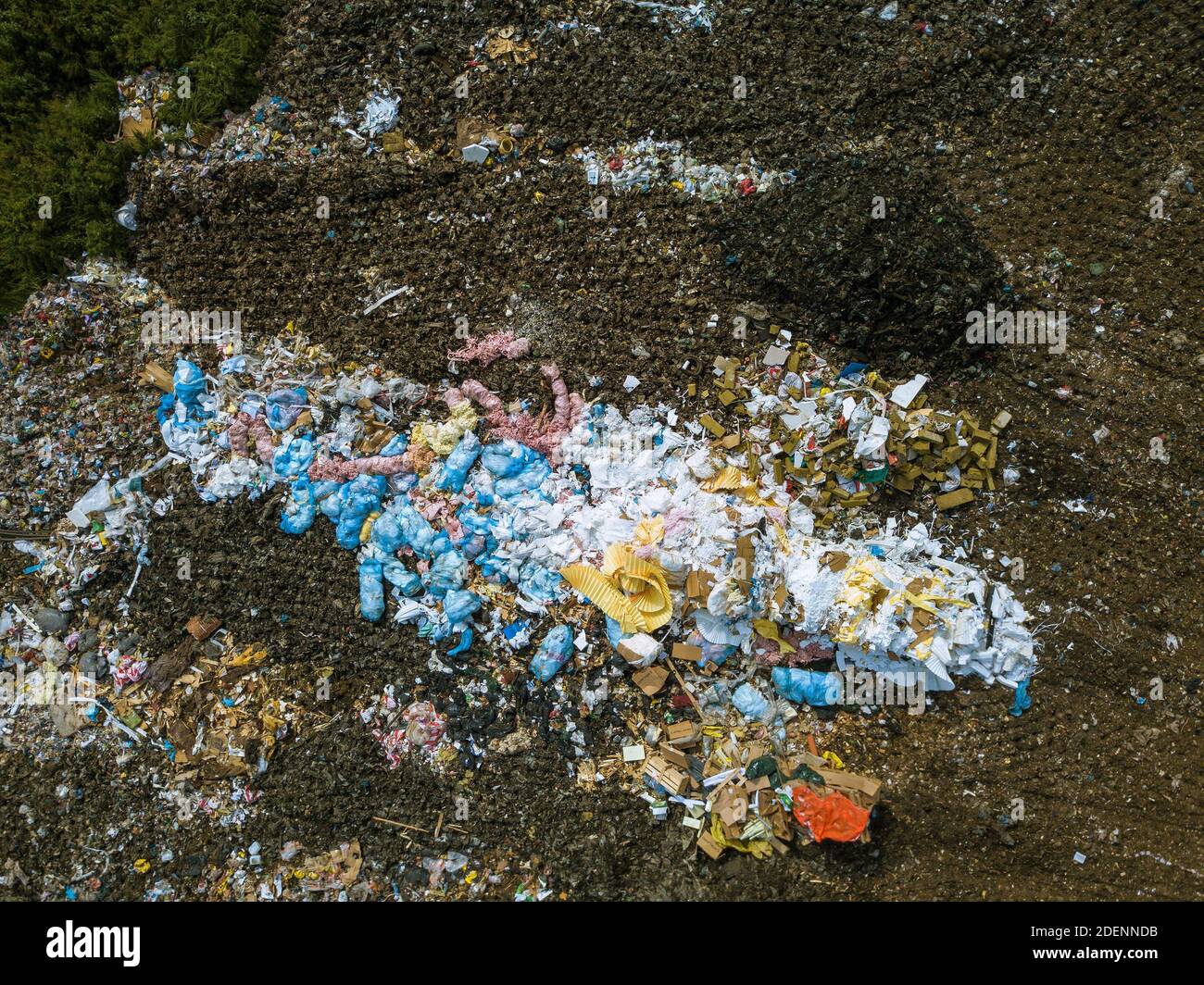 Top drone view of dumping site. A lot of garbage on landfill of big ...