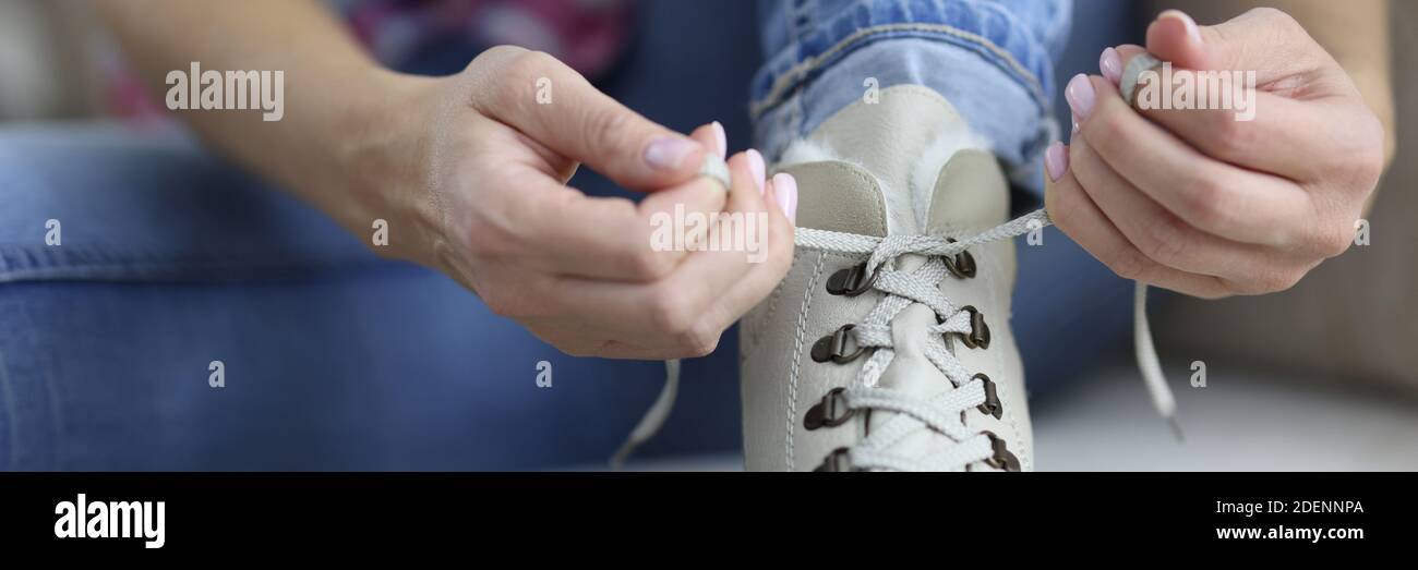 Sneakers tied shoe laces hi-res stock photography and images - Alamy