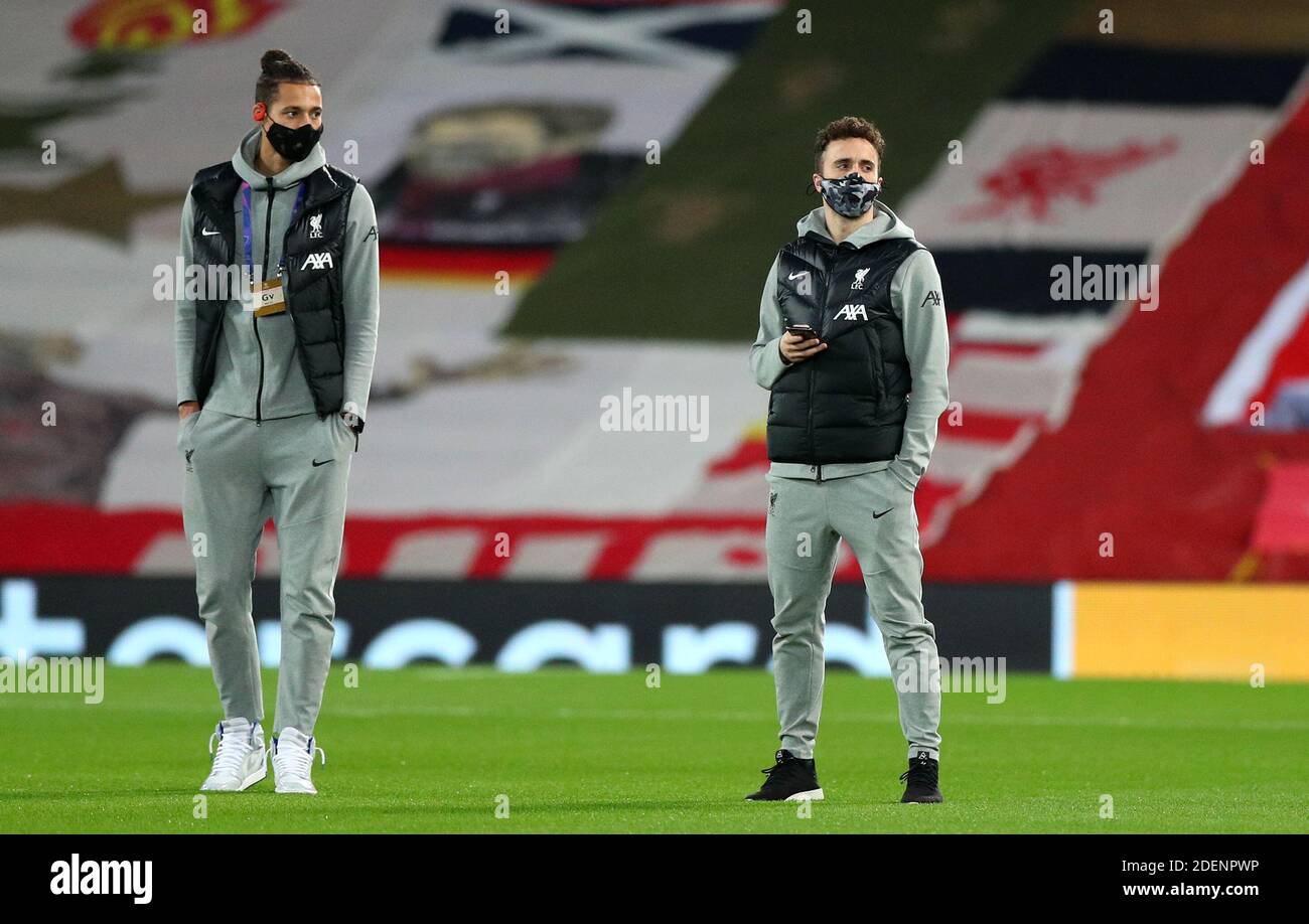 Liverpool's Diogo Jota (right) walks the pitch prior to the UEFA ...