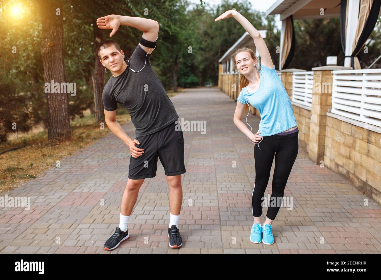 morning exercises for men and women, training before work Stock Photo ...