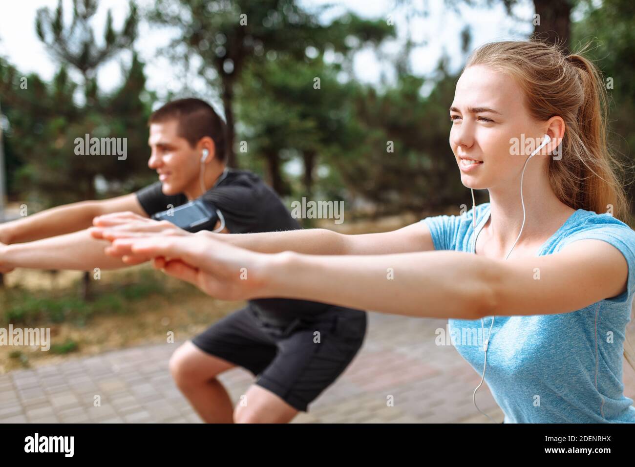 morning exercises for men and women, training before work Stock Photo ...
