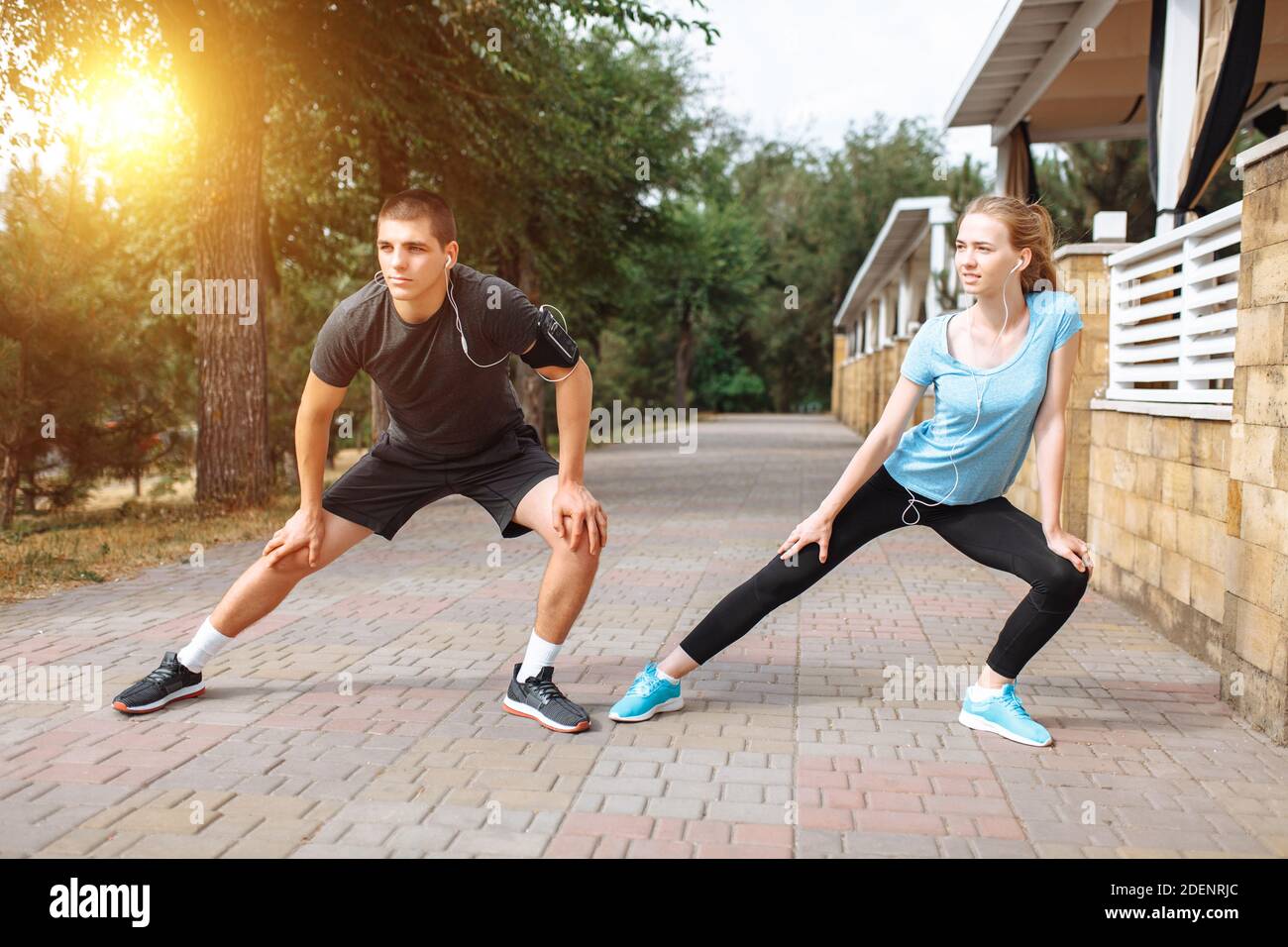 morning exercises for men and women, training before work Stock Photo ...