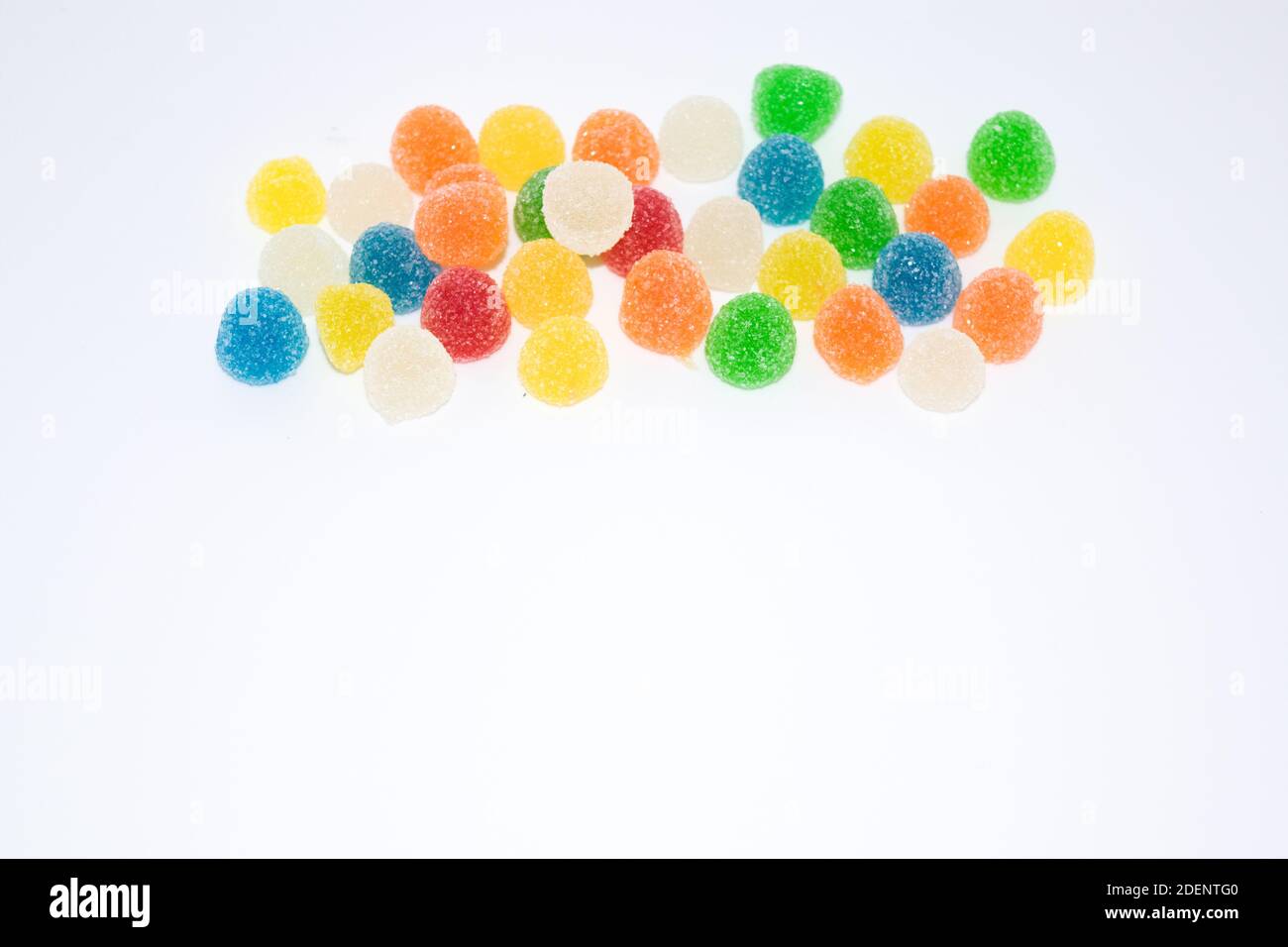 Colorful variety of gummies on bright white background Stock Photo - Alamy