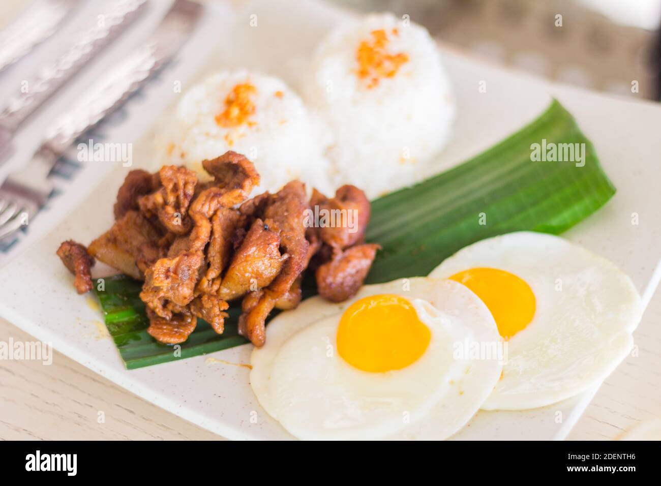 Tocilog, a traditional Filipino breakfast at a resort restaurant in Baler, Philippines Stock ...