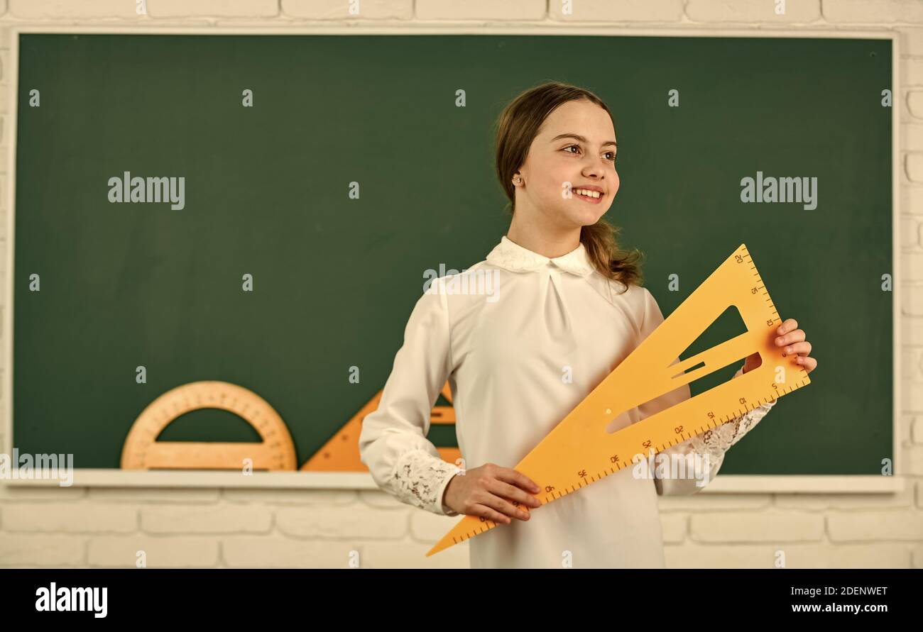 Girl ready to study. Student girl at school. study math with triangle ...