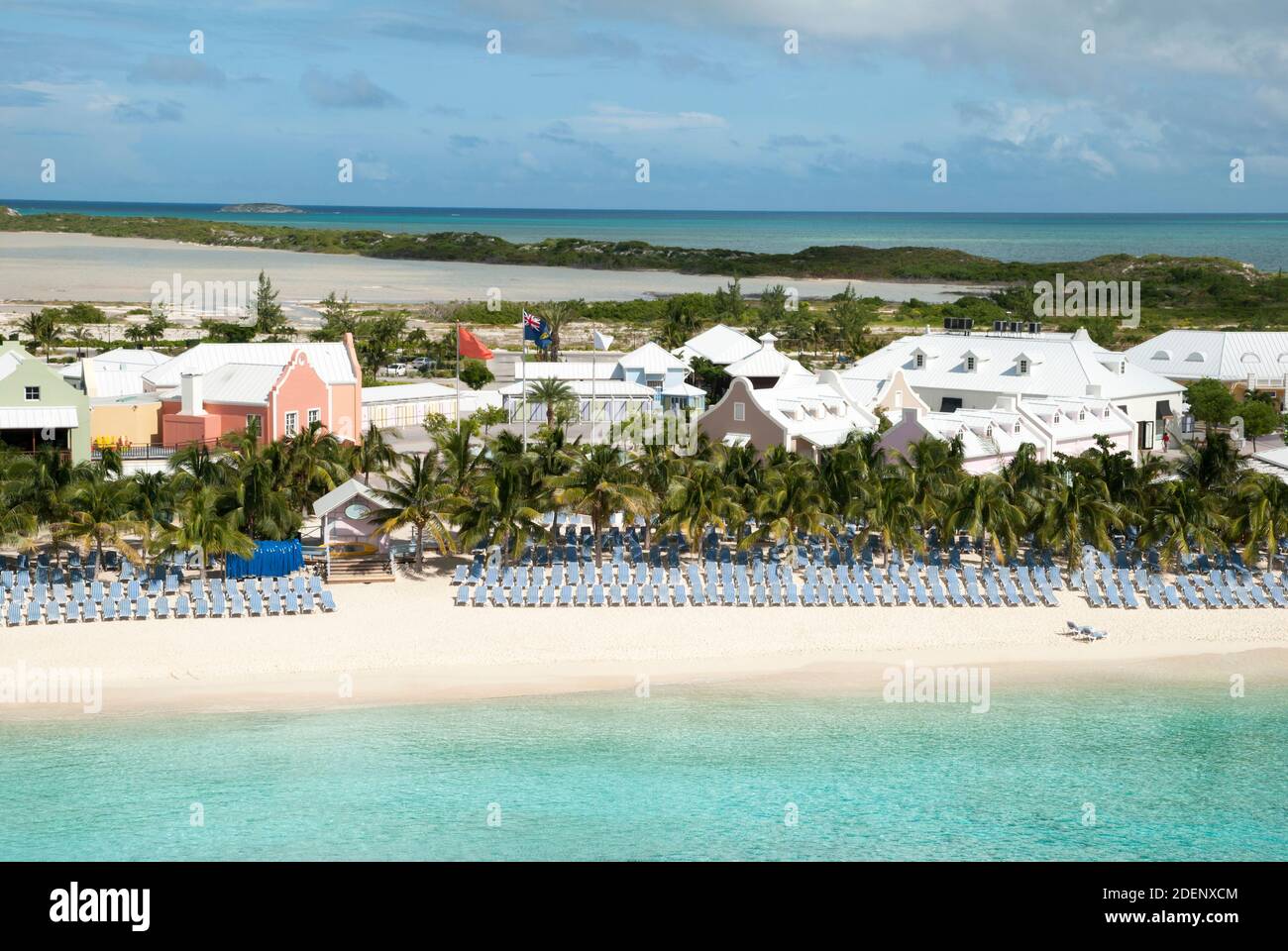 The aerial view of an empty tourist beach with Grand Turk island lagoon ...