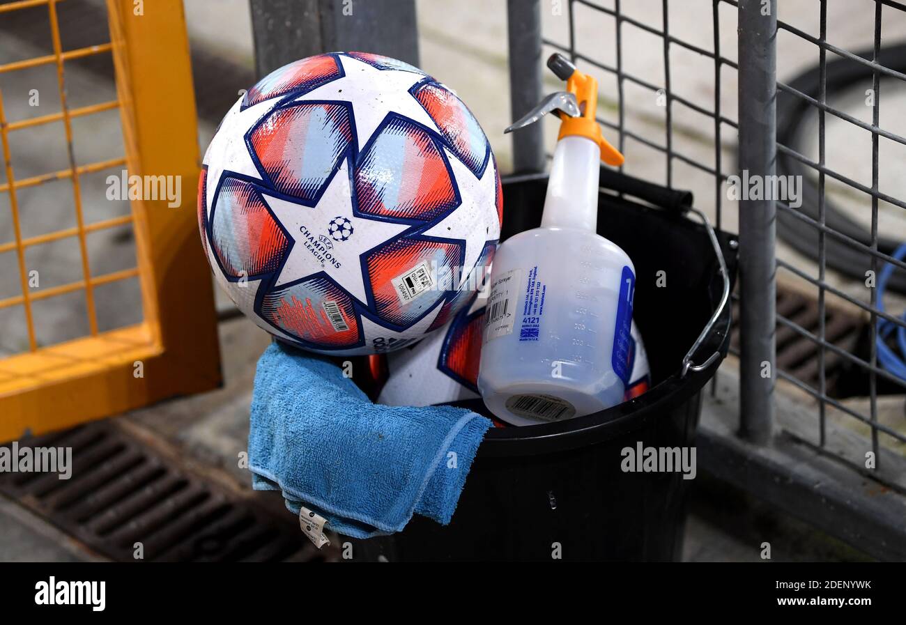 A Champions league ball and disinfectant cleaning products pitch side ...