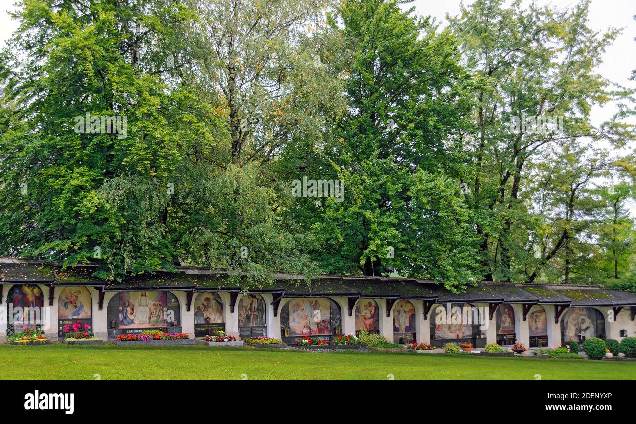 grave sites with mural paintings along the bounding wall of the ...