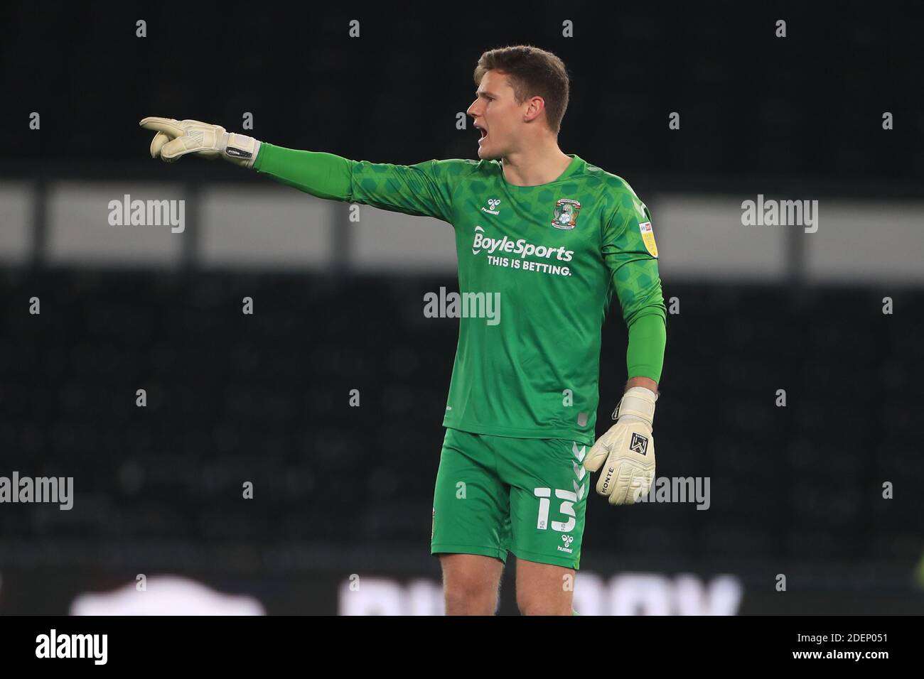 Coventry City goalkeeper Ben Wilson instructs his players during the ...