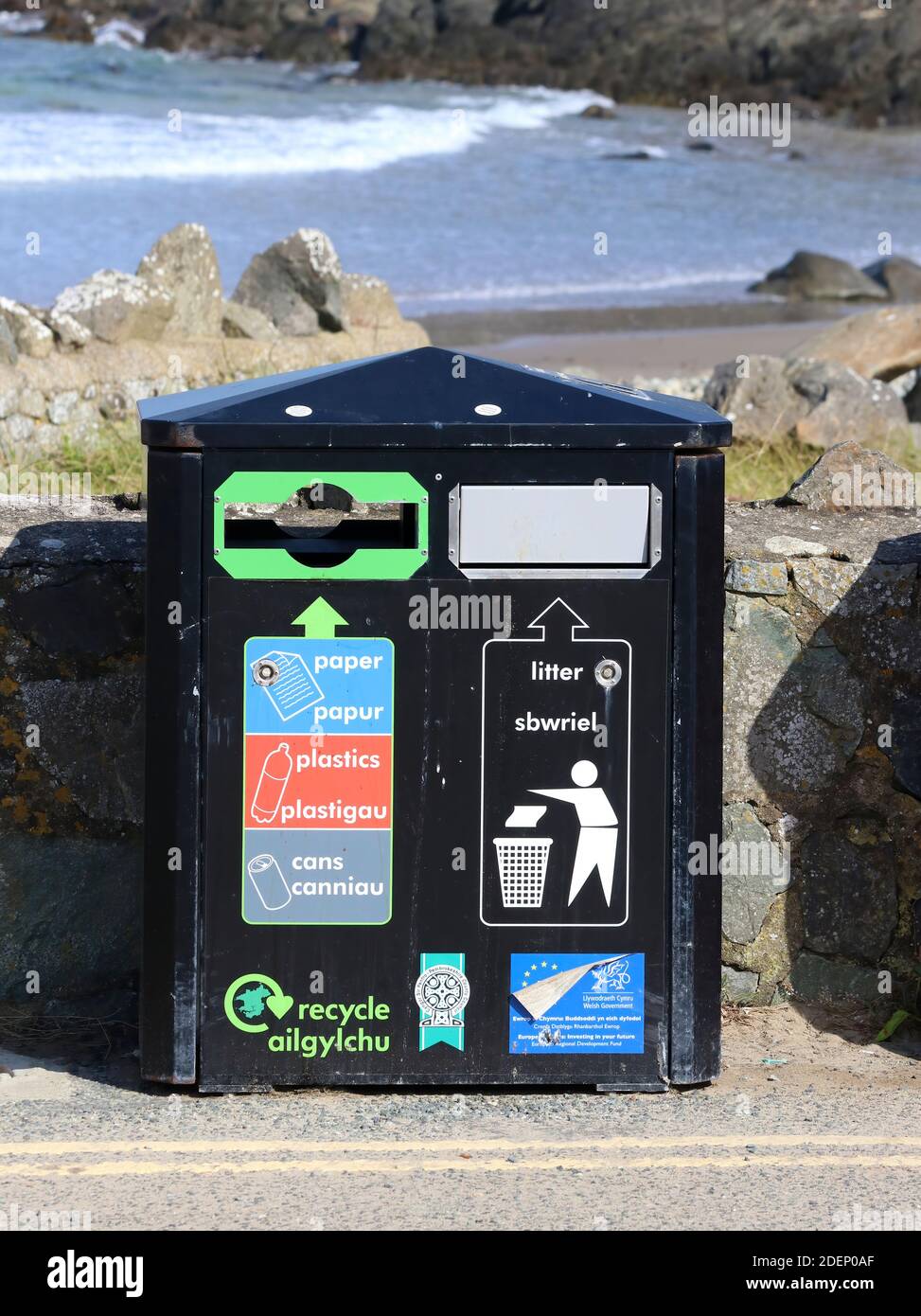 recycling bin next to the beach Stock Photo - Alamy