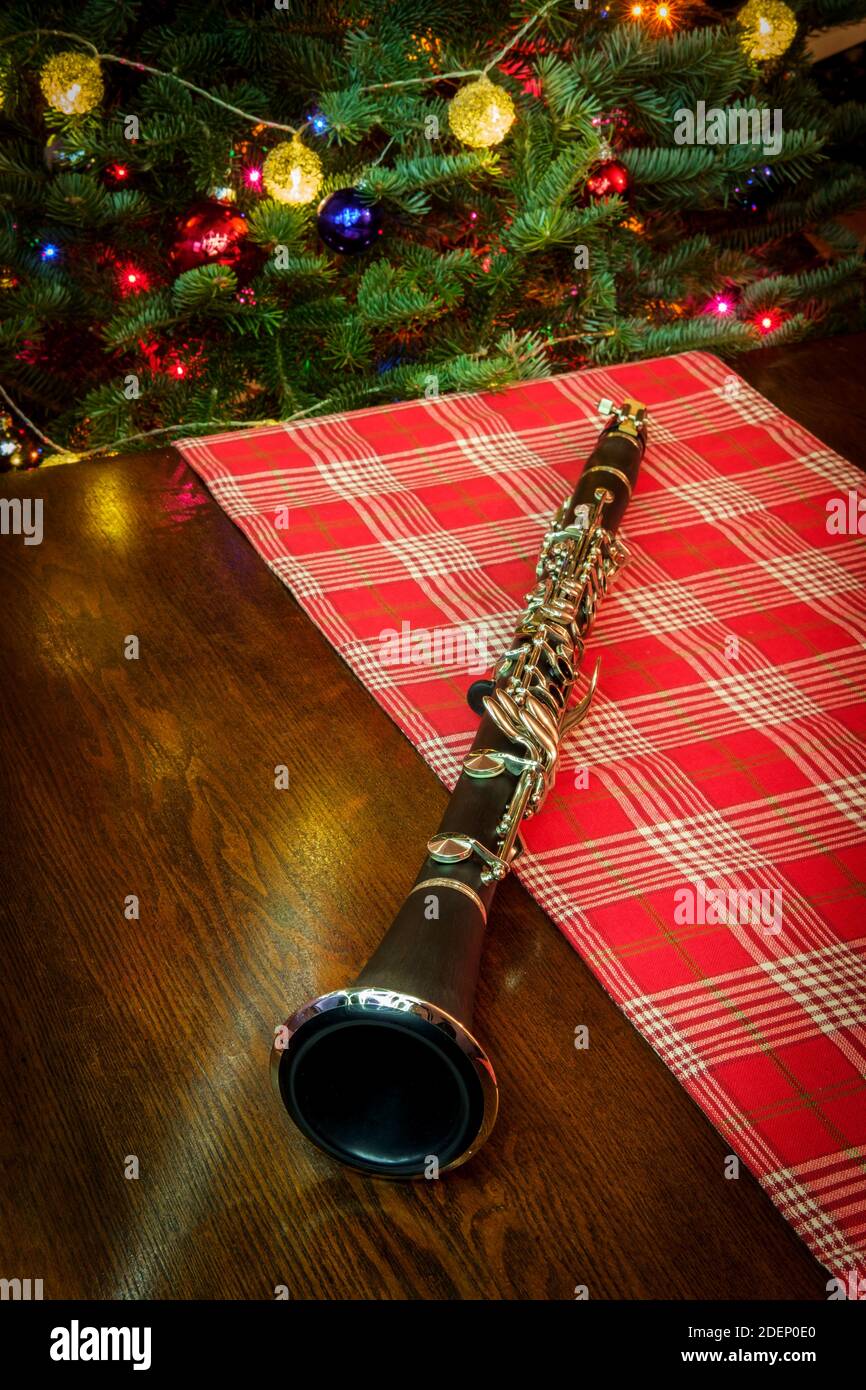 Seasonal holiday musical instrument clarinet with Christmas tree ...