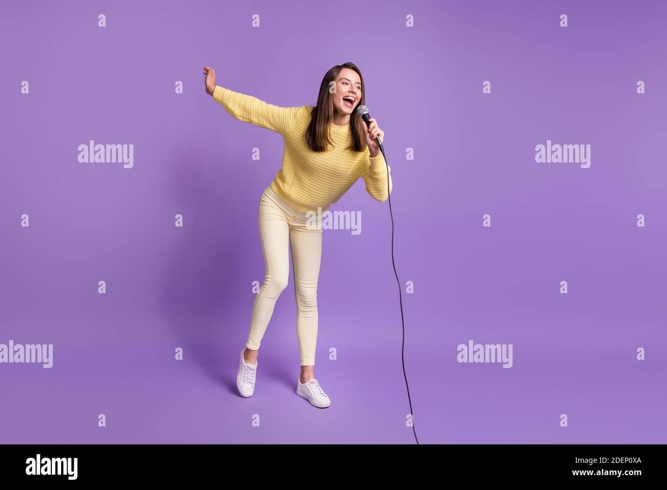 Female singer microphone full body hi-res stock photography and images ...