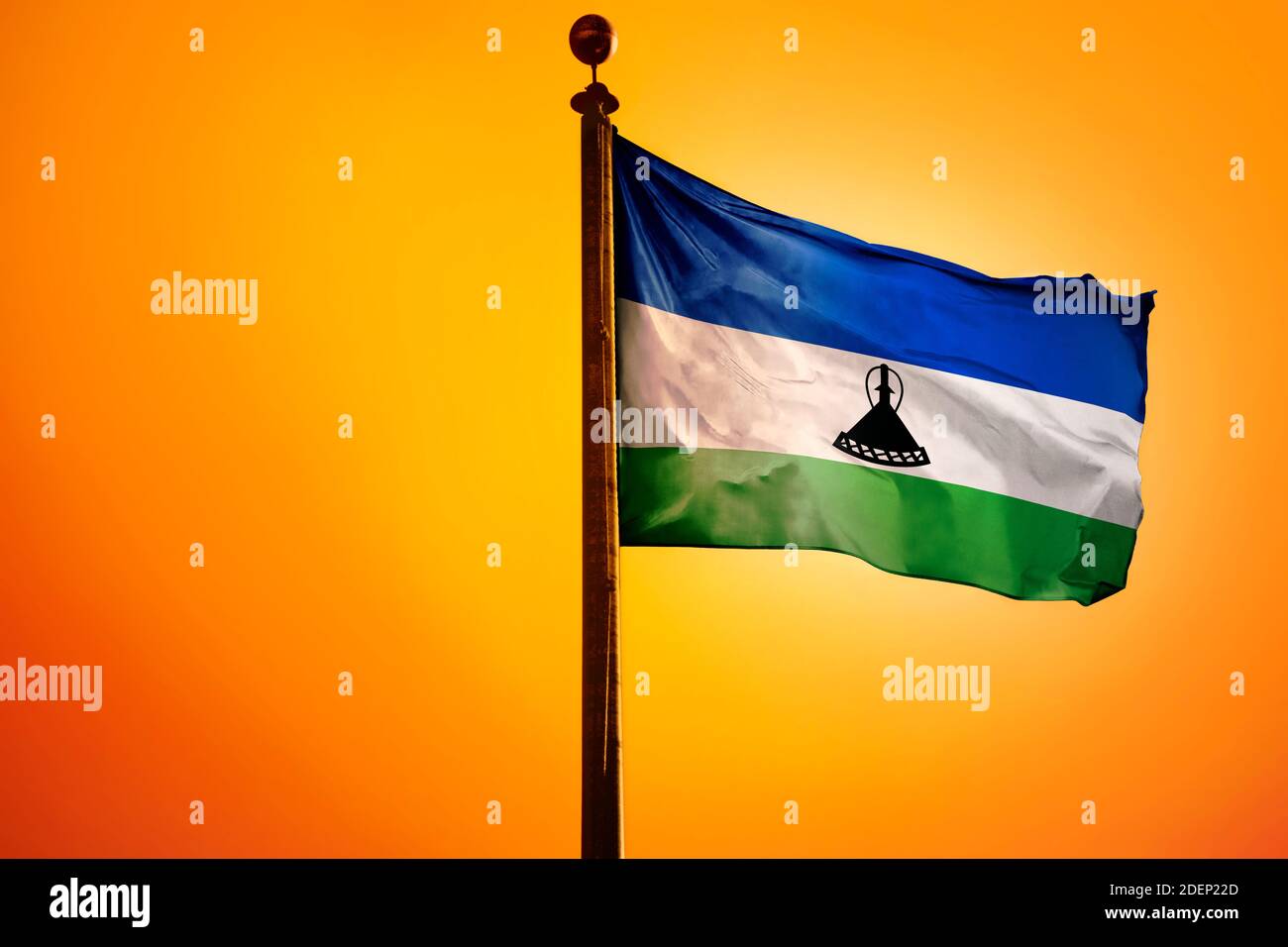 Lesotho Flag, Flag waving with Sunrise Stock Photo - Alamy