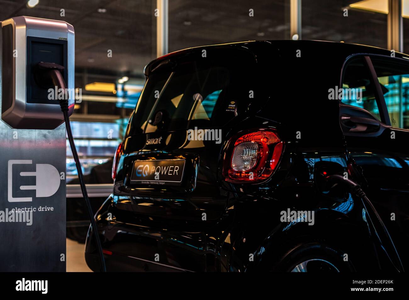 Stuttgart, Germany - August 8, 2020: charging an electric car SMART at ...