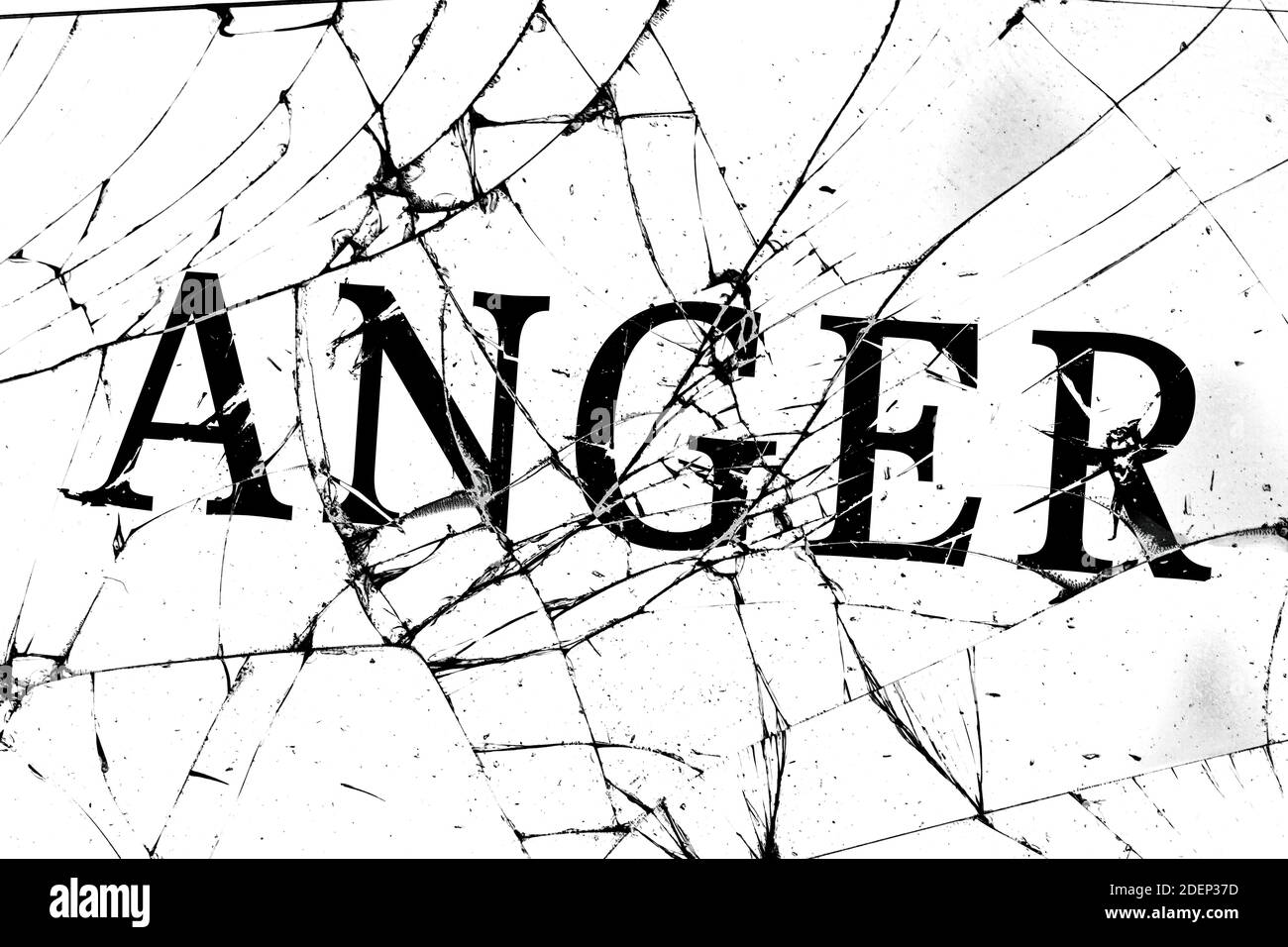 broken glass with cracks with the inscription anger Stock Photo - Alamy