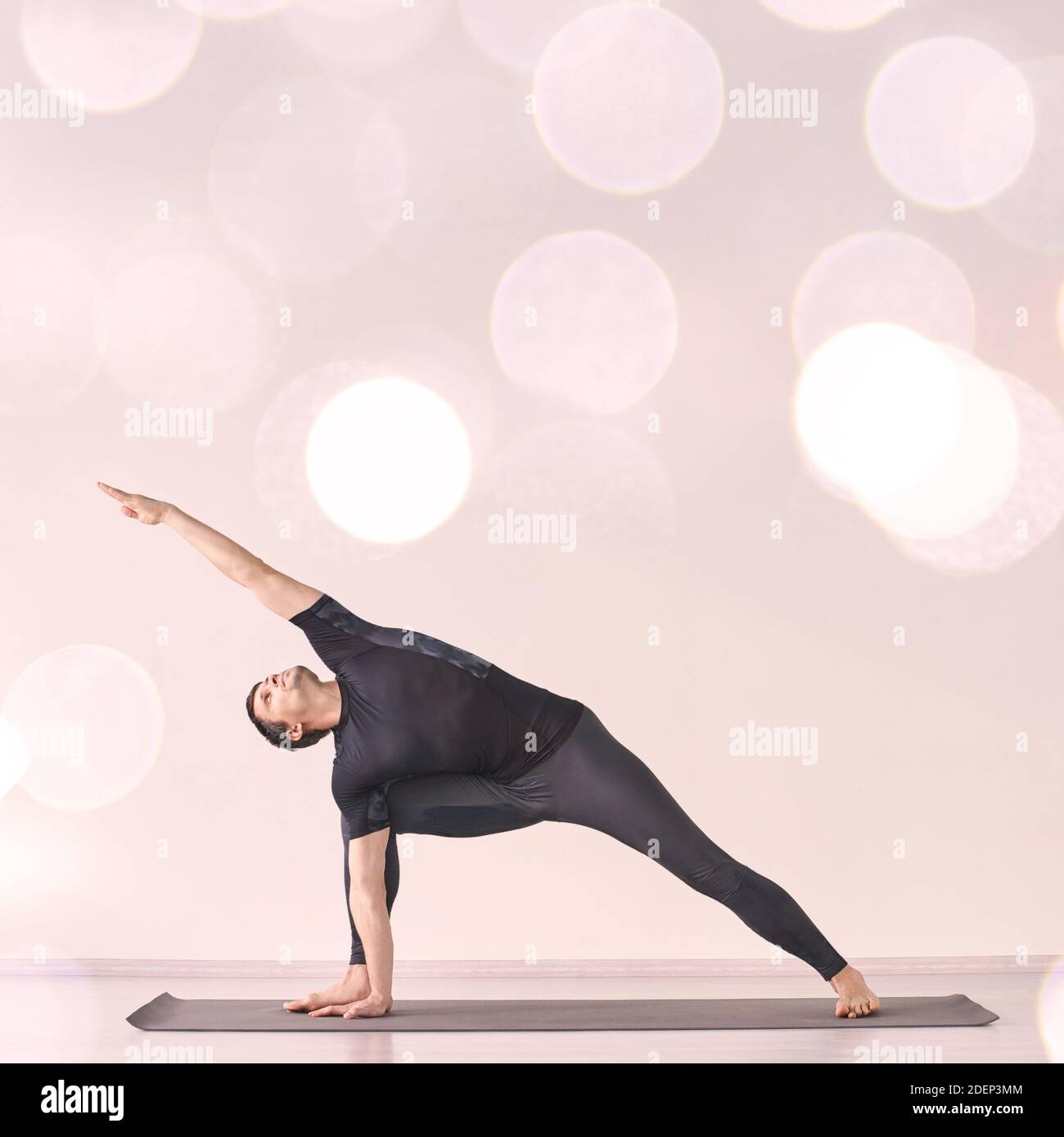Man in yoga asana. Home studio. One person Stock Photo - Alamy