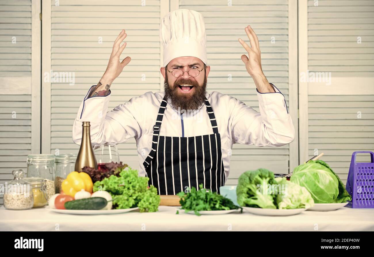 Chef at work starting shift. Guy in professional uniform ready cook ...