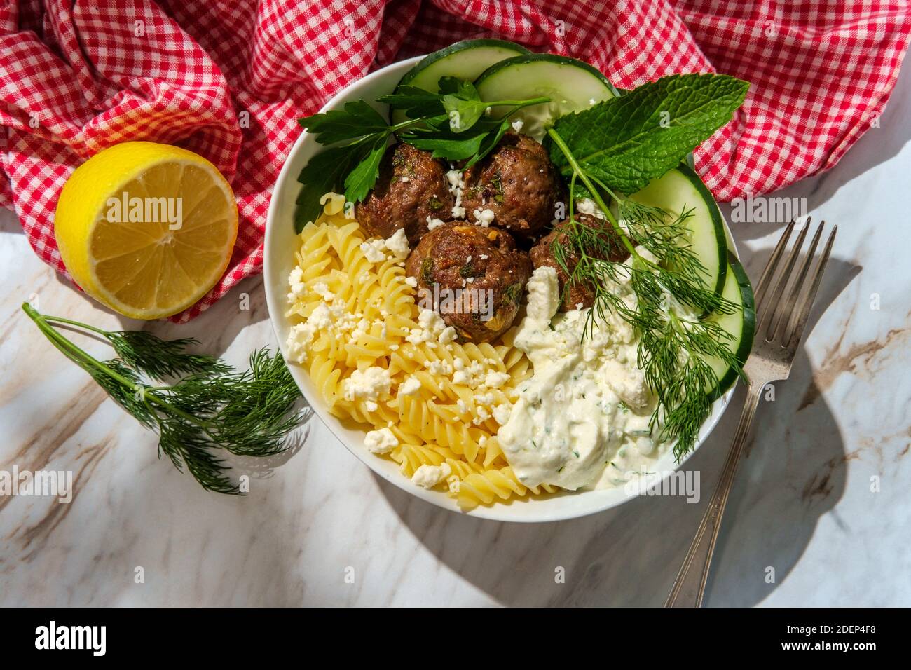 Greek lamb keftedes meatballs with tzatziki yogurt sauce served with ...