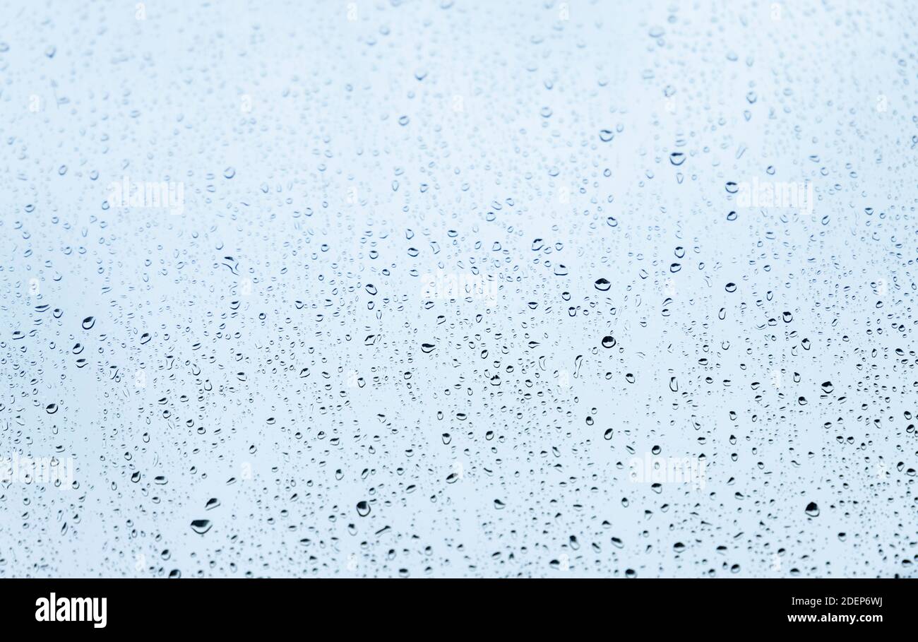 Water drops are on a glass, background photo texture Stock Photo - Alamy