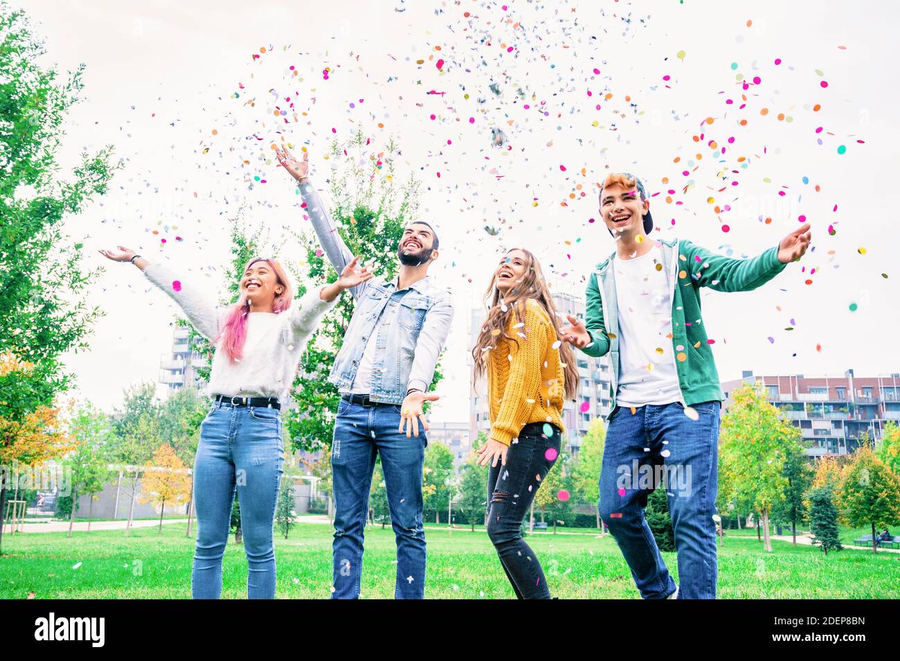 Girl throwing confetti hi-res stock photography and images - Alamy