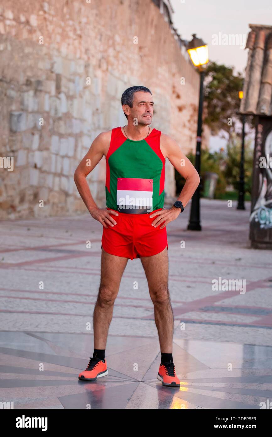 Portuguese runner man of middle age on a urban city Stock Photo - Alamy