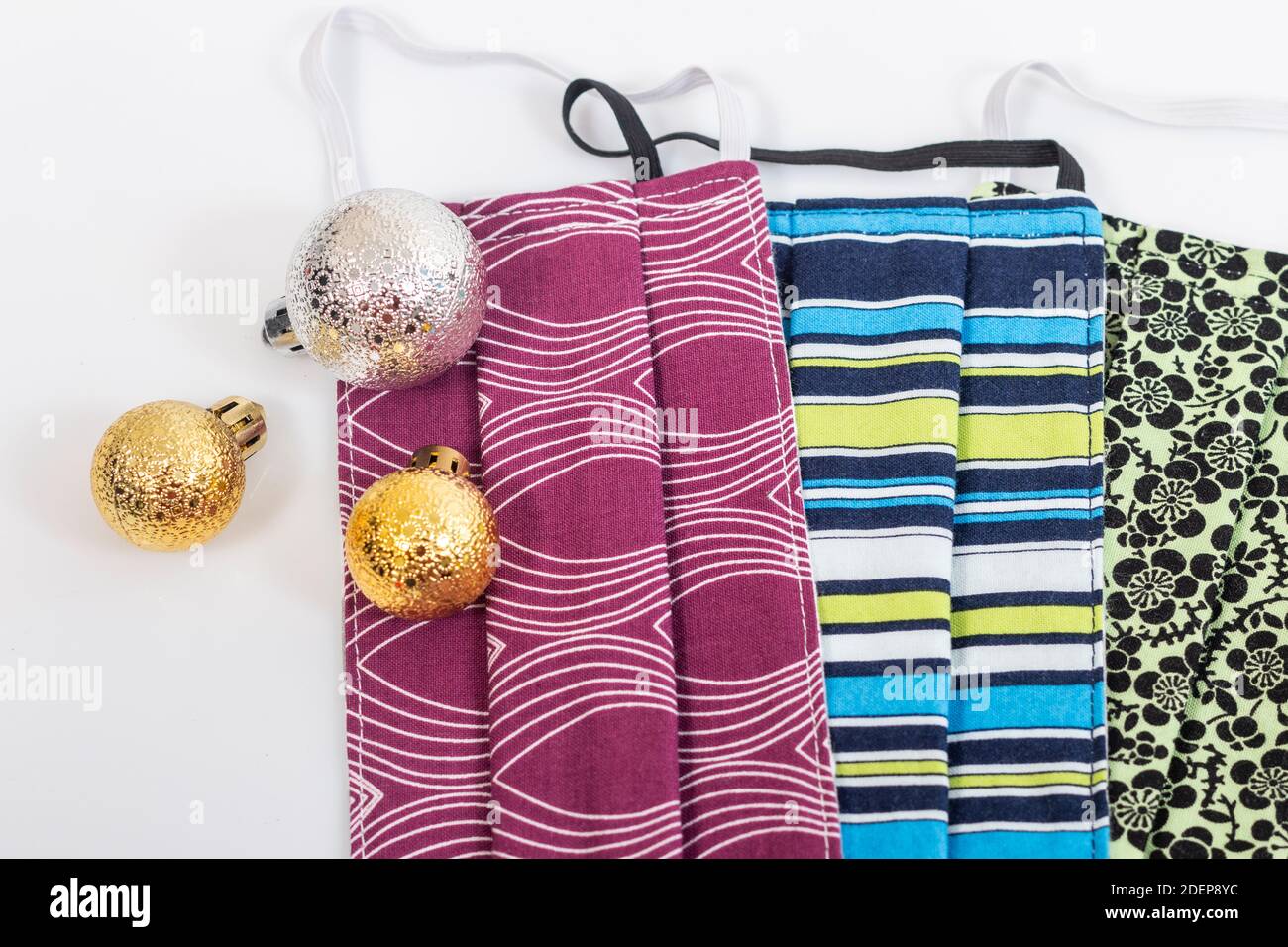 handmade colorful face masks isolated on a white background Stock Photo ...