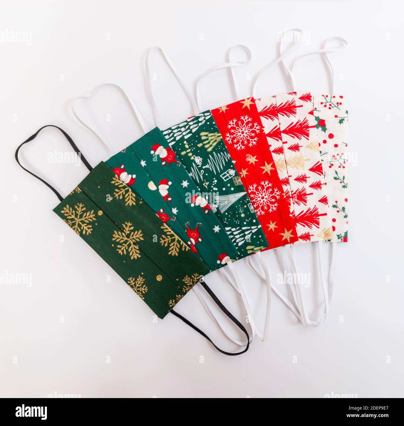 christmas handmade colorful face masks isolated on a white background ...