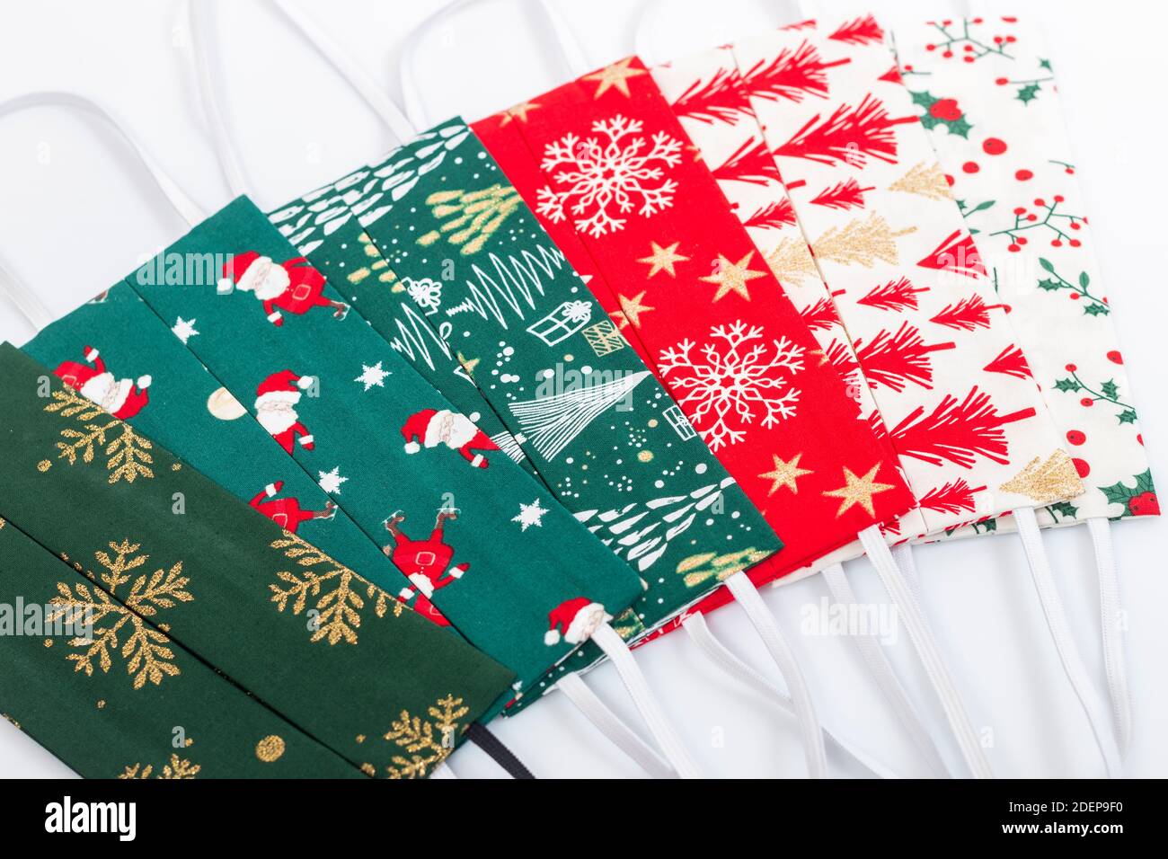 christmas handmade colorful face masks isolated on a white background ...