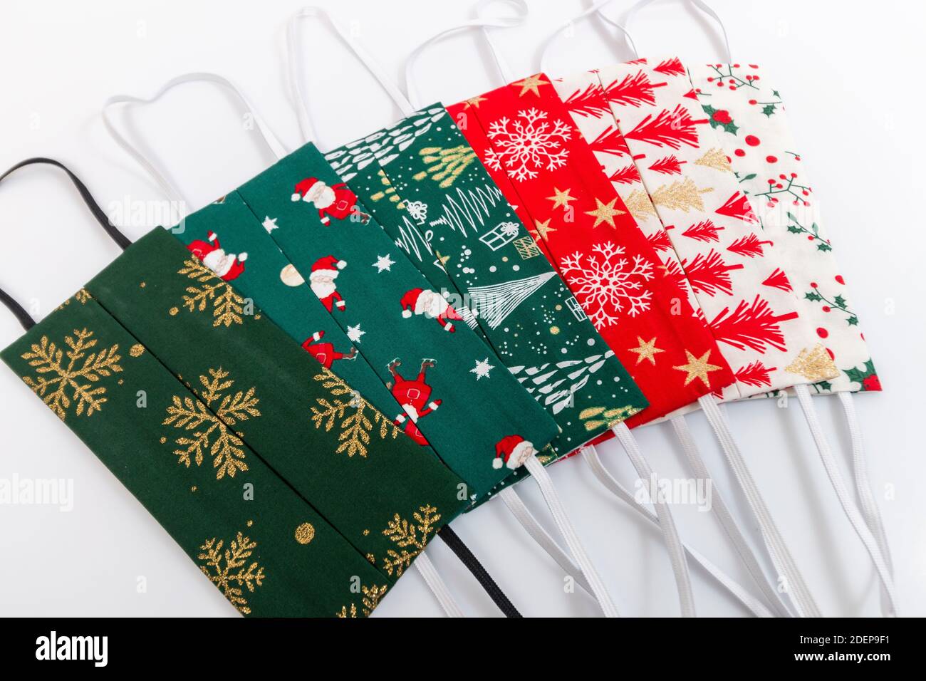 christmas handmade colorful face masks isolated on a white background ...
