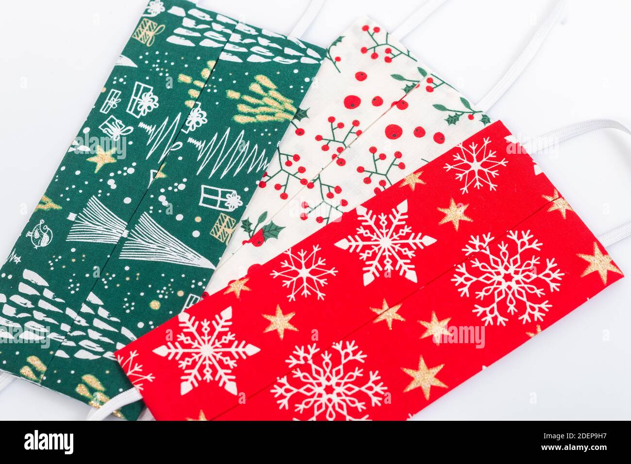 christmas handmade colorful face masks isolated on a white background ...