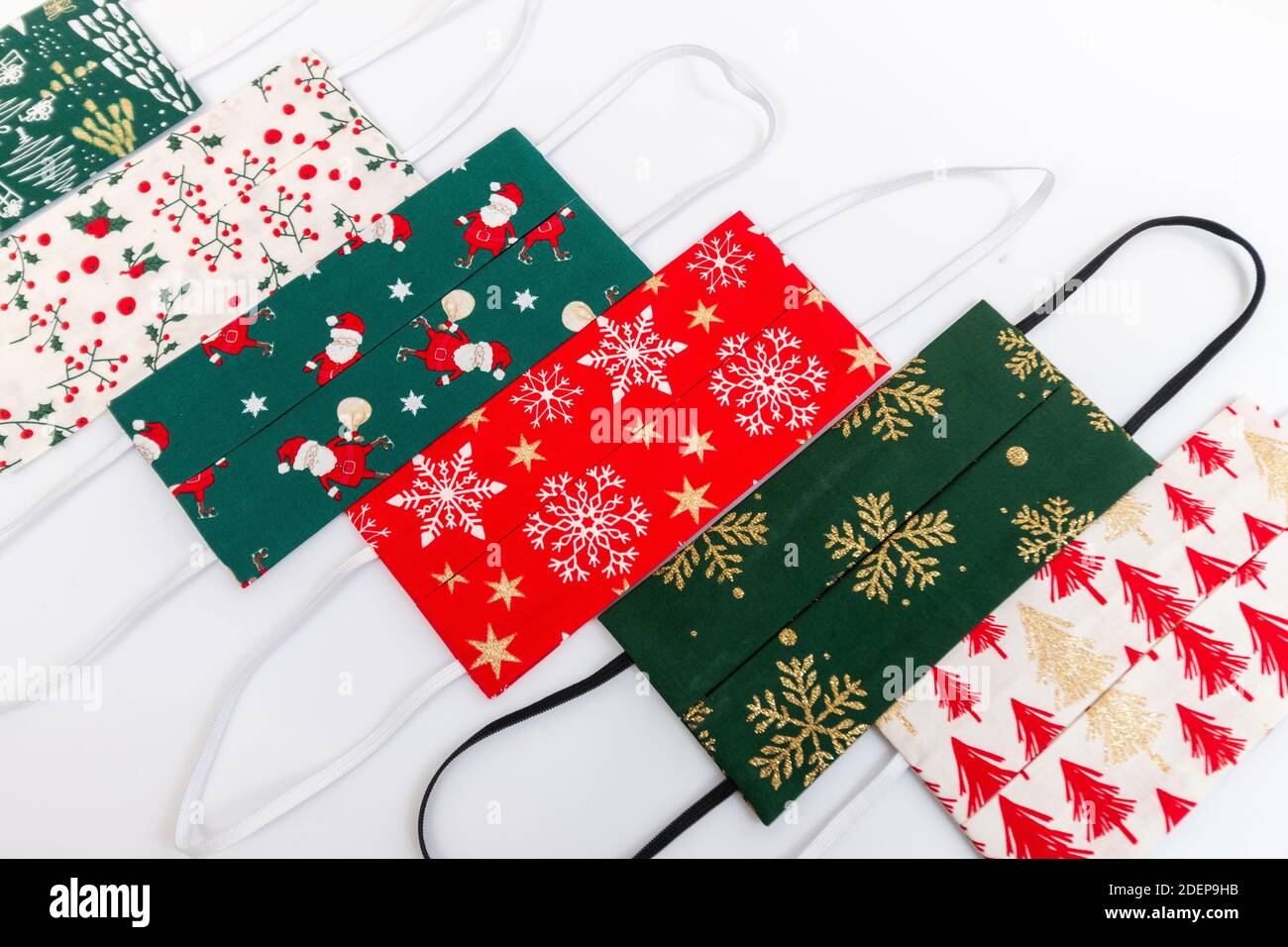 christmas handmade colorful face masks isolated on a white background ...