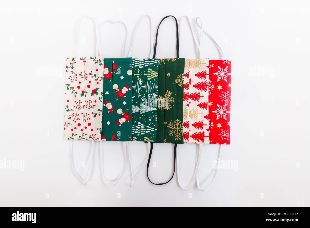 christmas handmade colorful face masks isolated on a white background ...