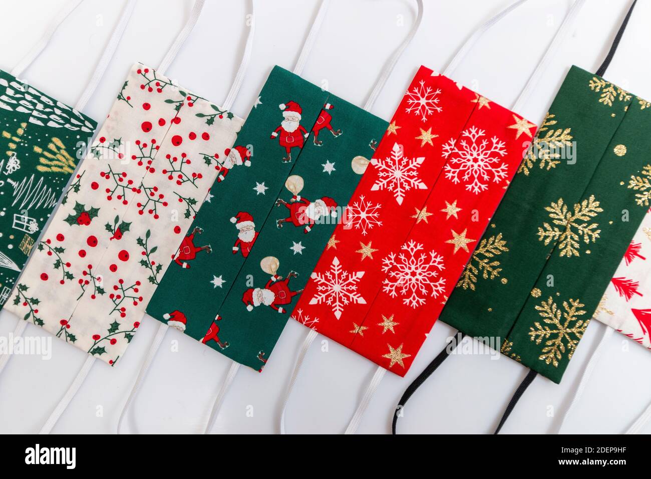 christmas handmade colorful face masks isolated on a white background ...